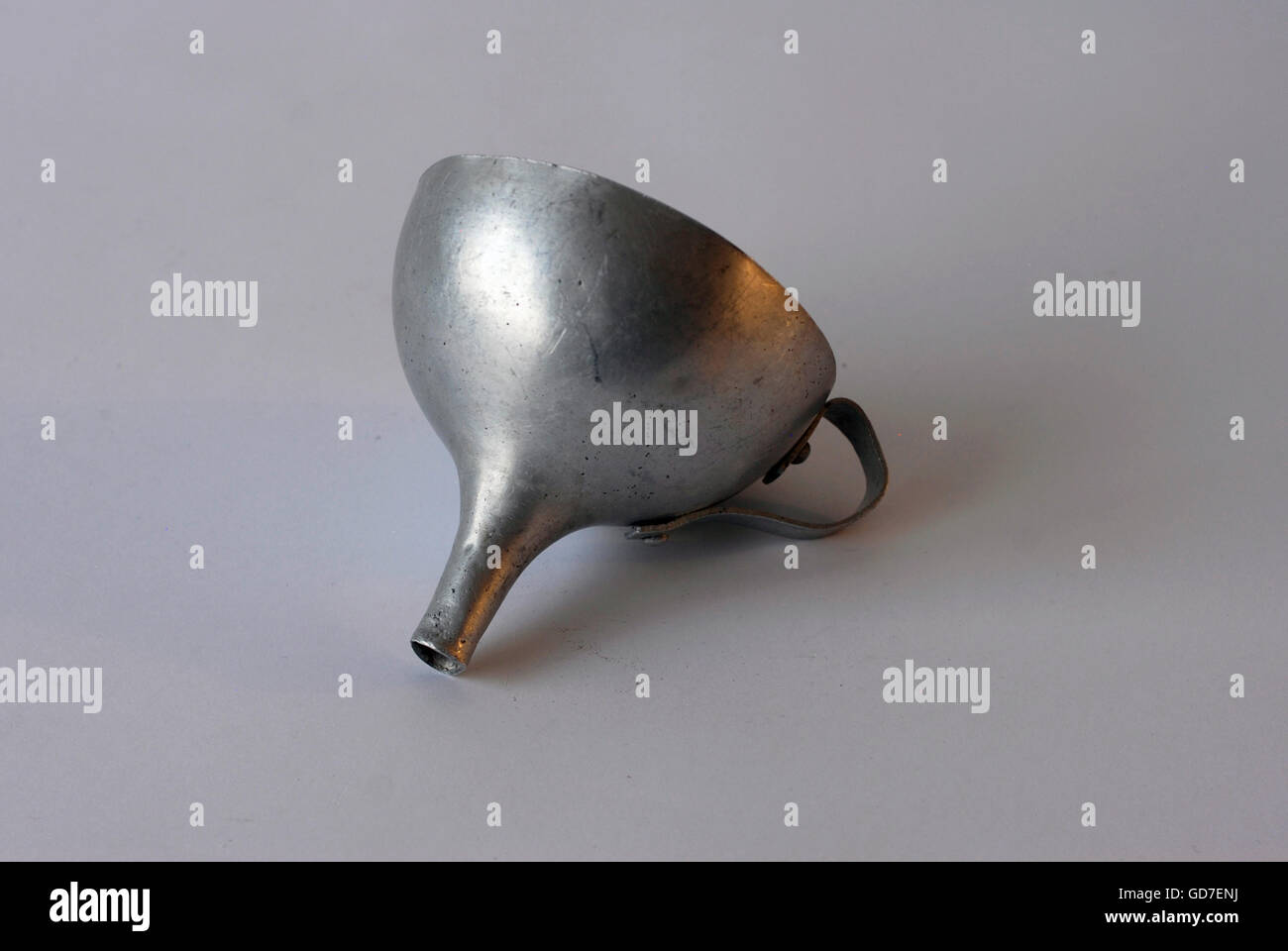 Old aluminum funnel for kitchen Stock Photo - Alamy