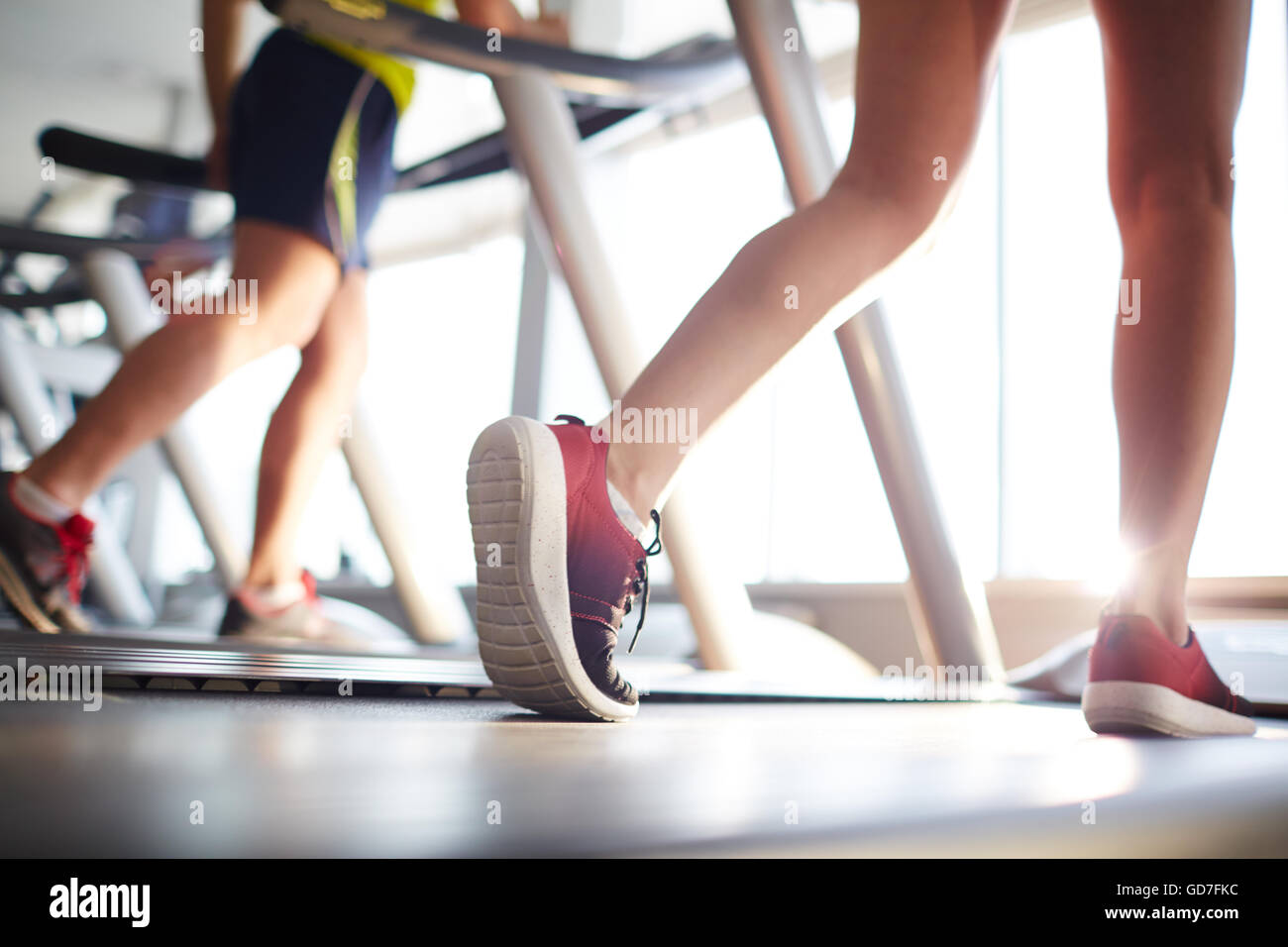 Legs of sportswoman Stock Photo - Alamy
