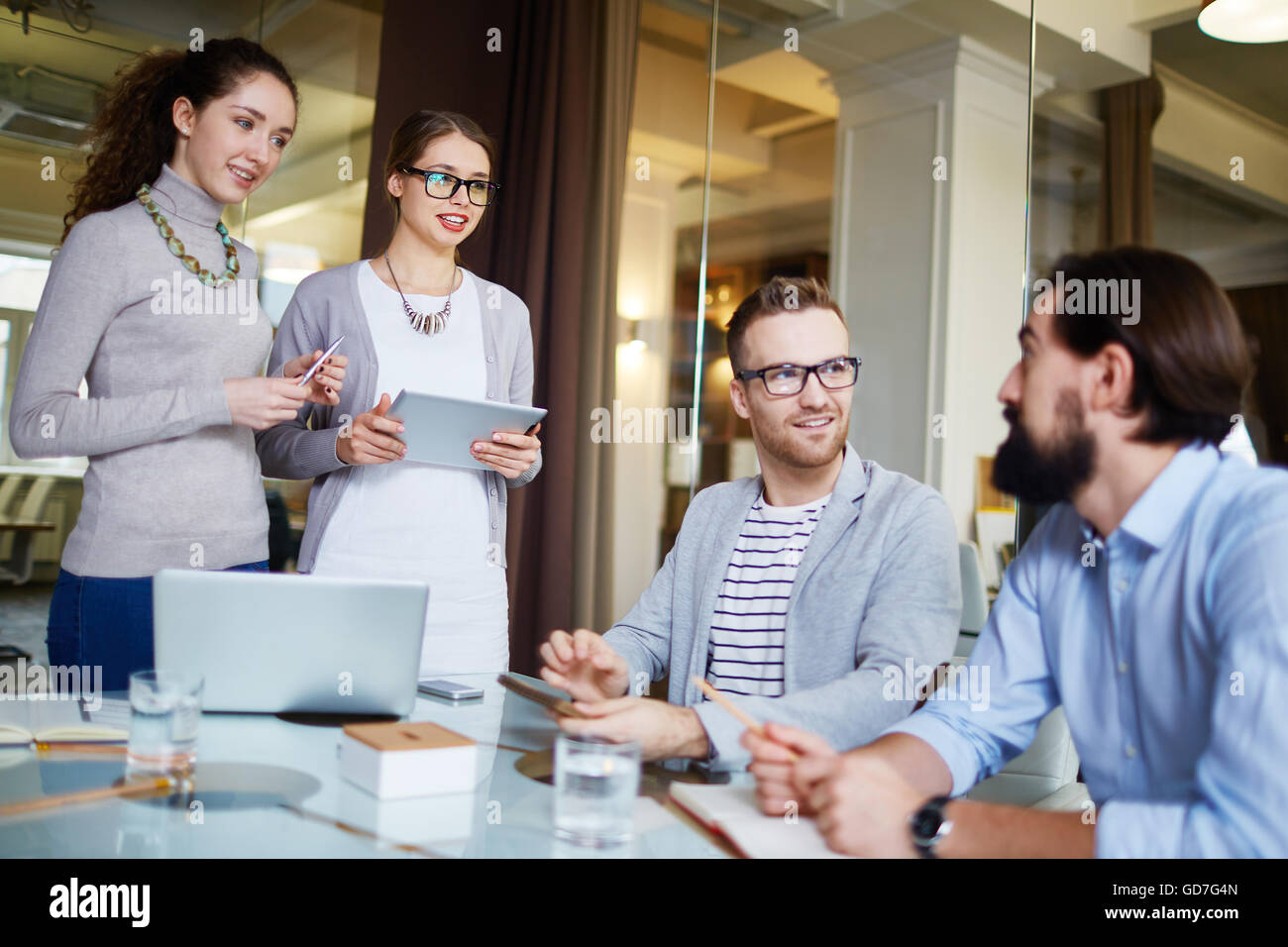 Colleagues at work Stock Photo - Alamy