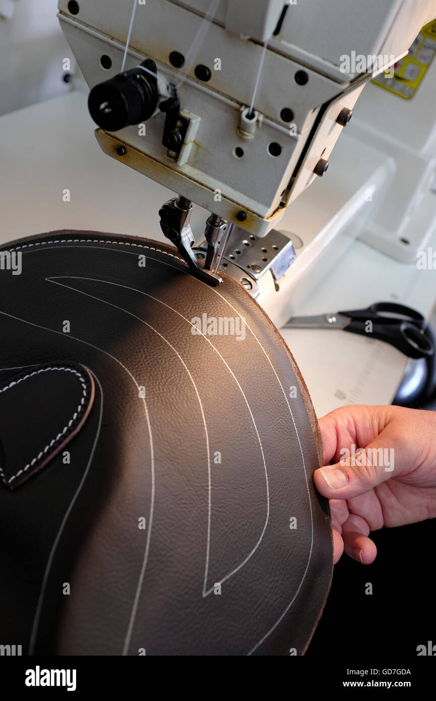 traditional handmade leather saddle making Stock Photo - Alamy