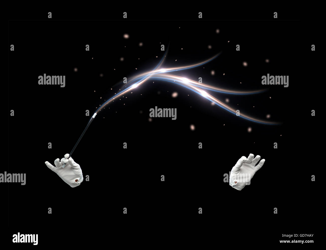 magician hands with magic wand showing trick Stock Photo - Alamy