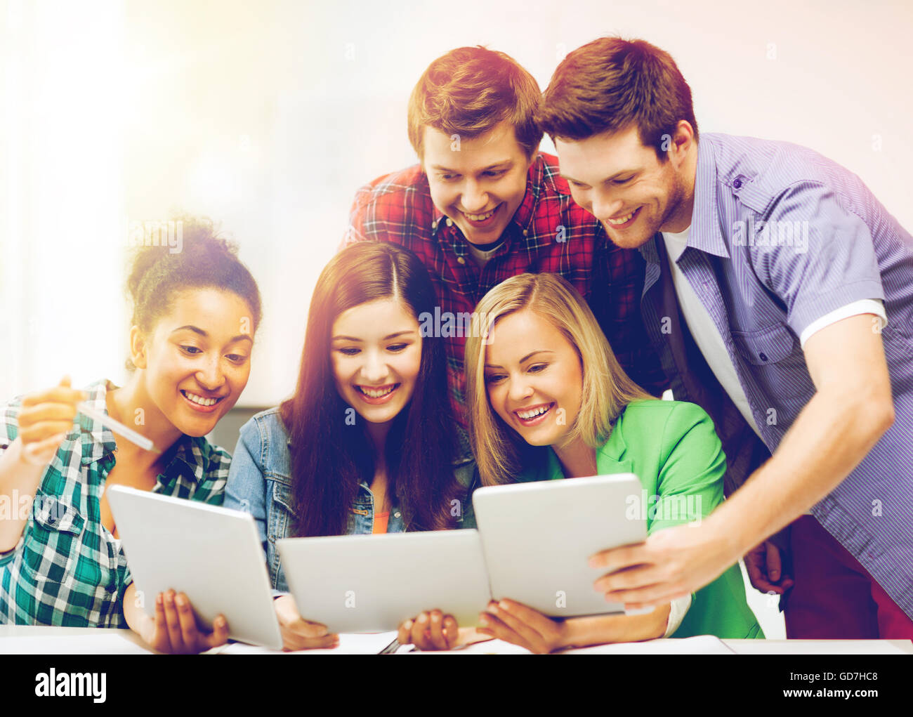 students looking at tablet pc in lecture at school Stock Photo - Alamy