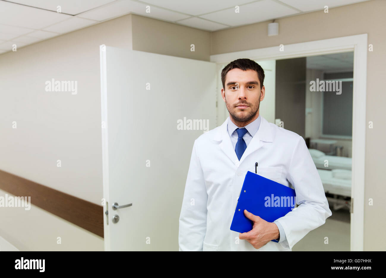 doctor with clipboard at hospital Stock Photo - Alamy