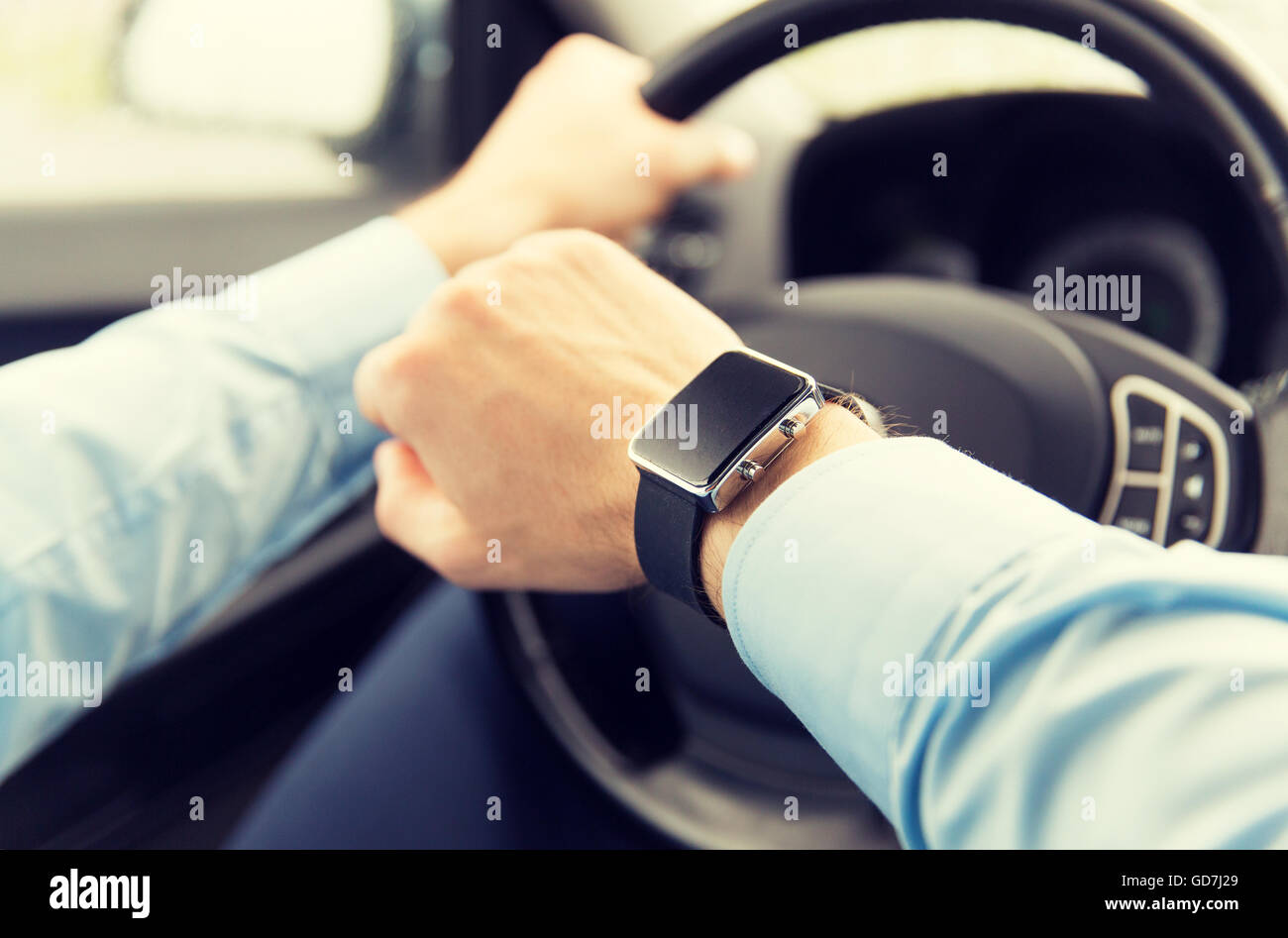 close up of man with wristwatch driving car Stock Photo - Alamy