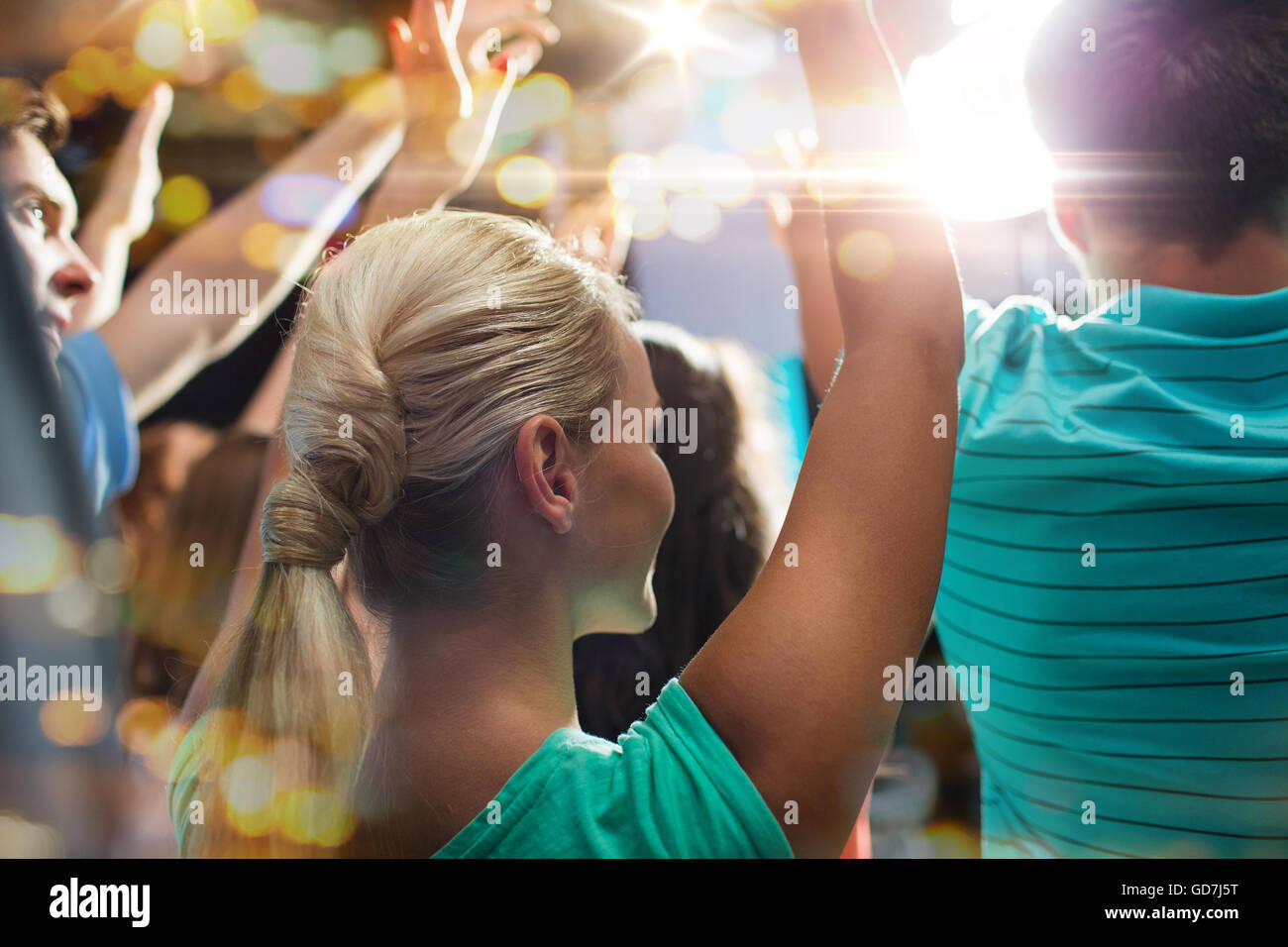 close up of happy people at concert in night club Stock Photo - Alamy