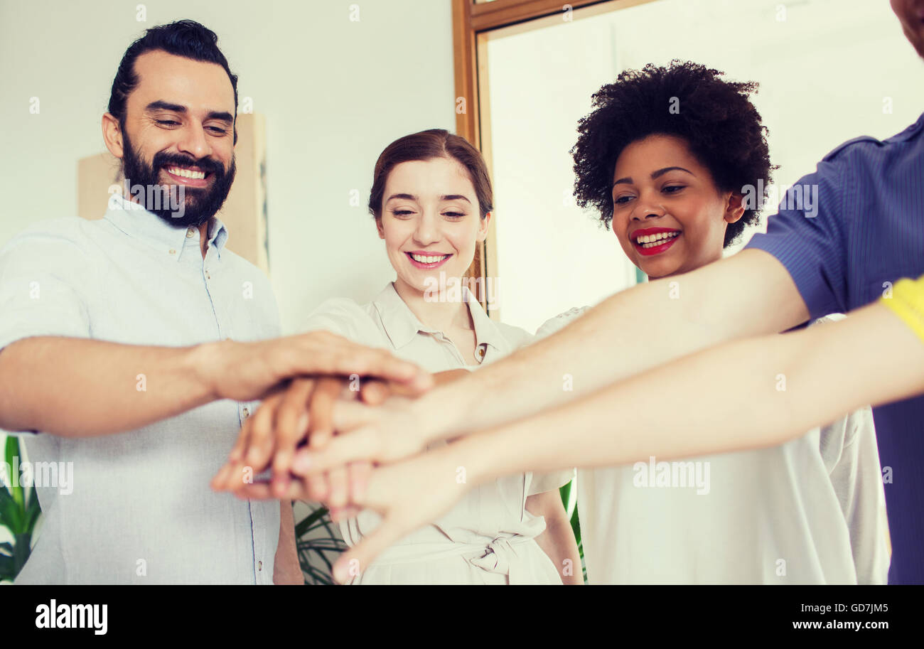 happy creative team in office Stock Photo - Alamy
