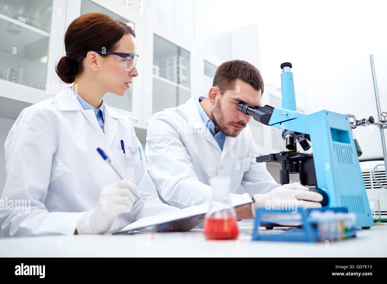 Research scientists making discovery in hi-res stock photography and ...