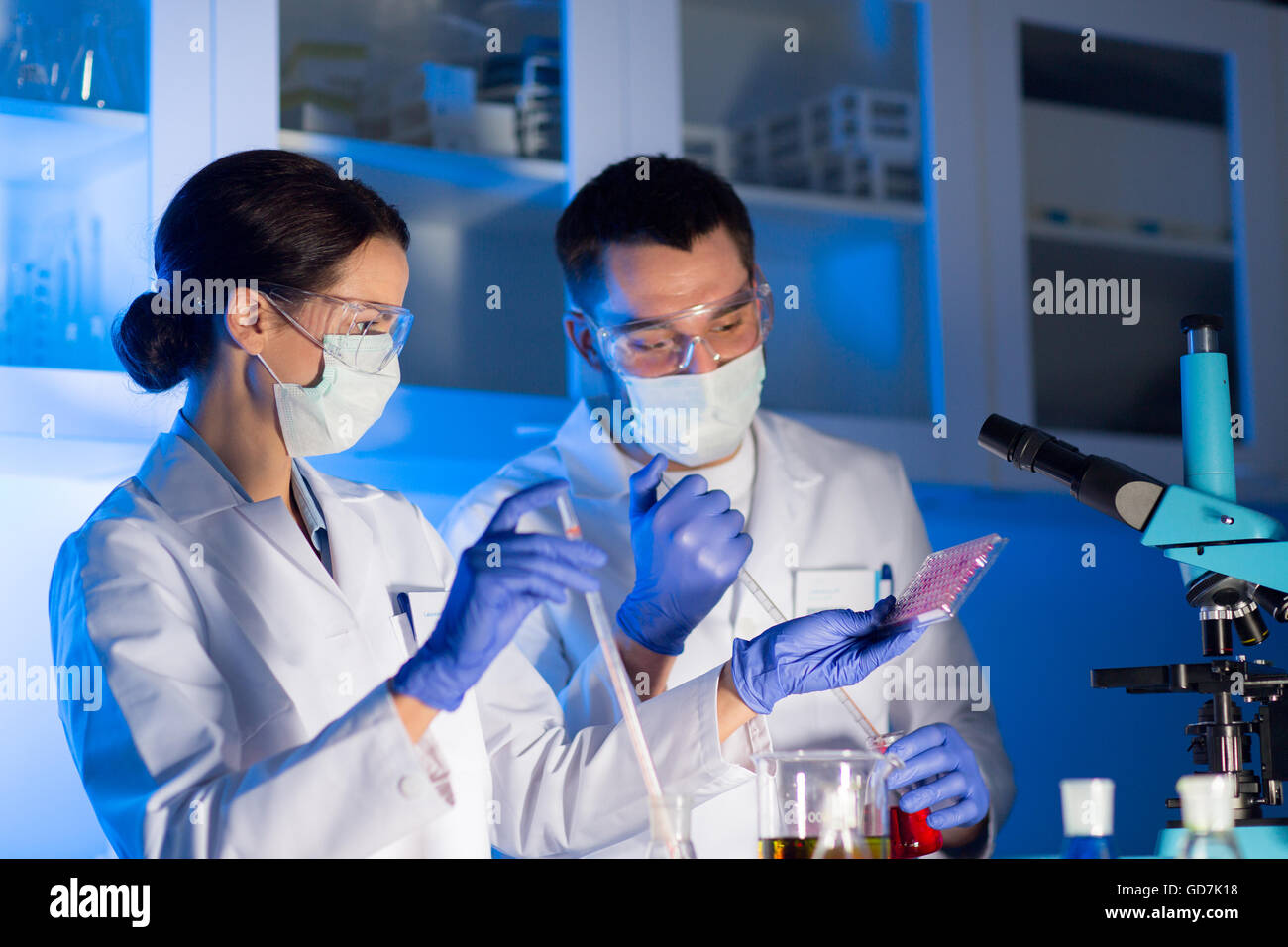 close up of scientists making test in lab Stock Photo - Alamy