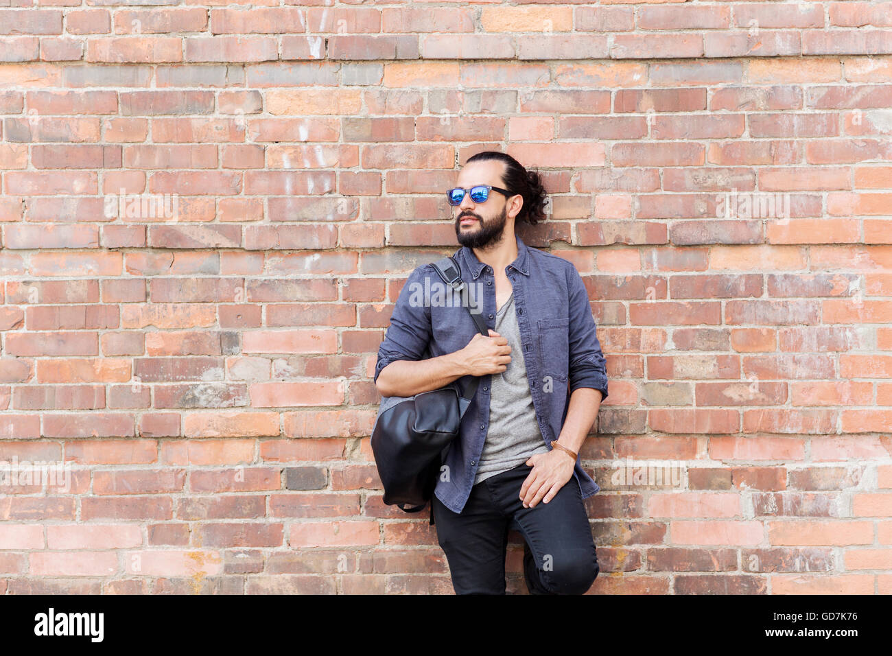 happy man with backpack standing at city street Stock Photo - Alamy