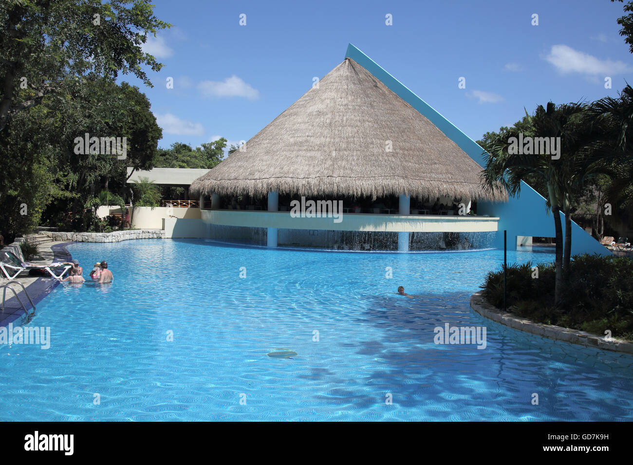 thatched bar and swimming pool at the xcaret resort cancun mexico Stock ...