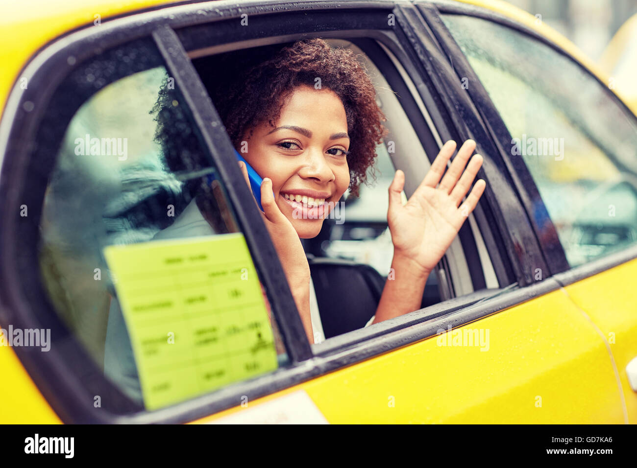 Girl calling taxi hi-res stock photography and images - Alamy