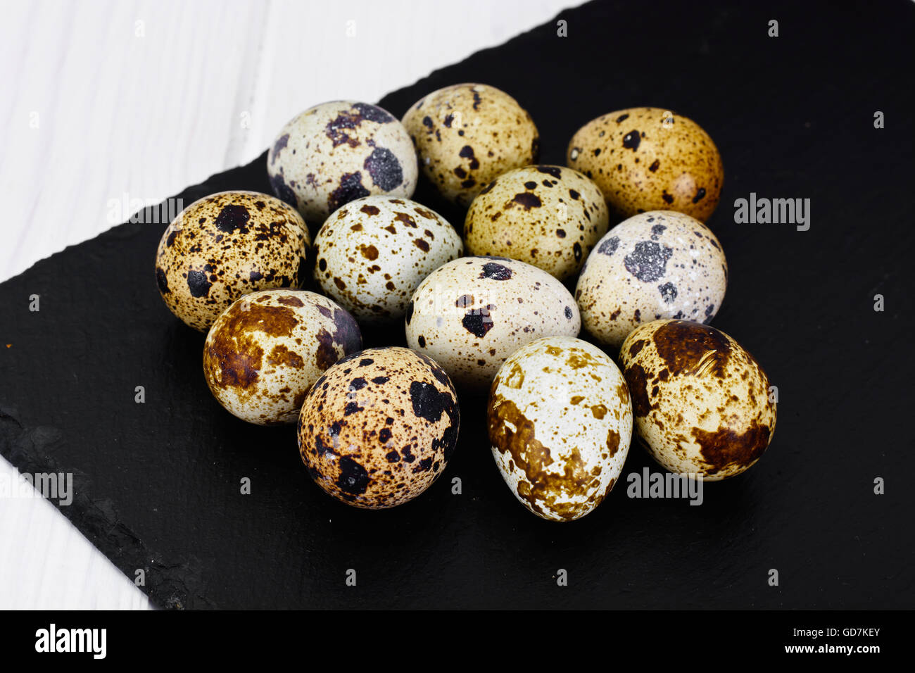 Quail eggs on black hi-res stock photography and images - Alamy