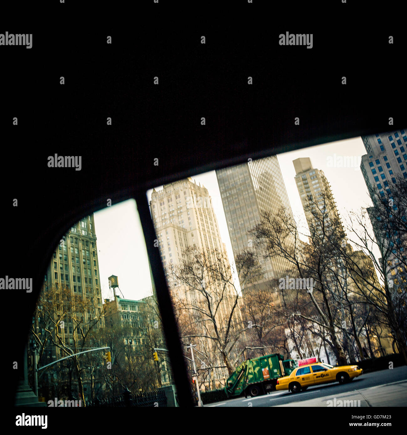Skyscrapers of Manhattan New York City viewed from through a yellow ...