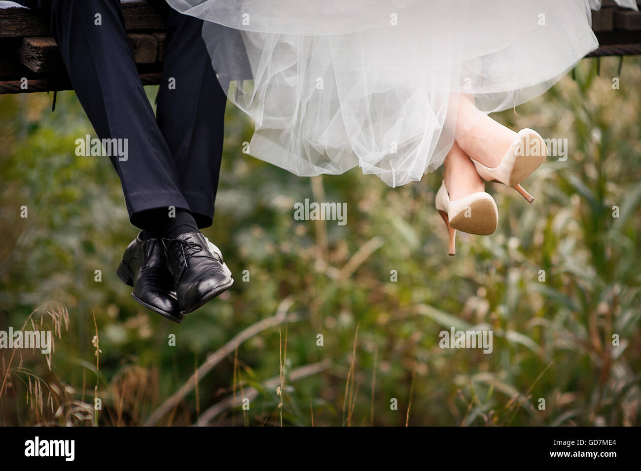 feet of bride and groom, wedding shoes Stock Photo - Alamy