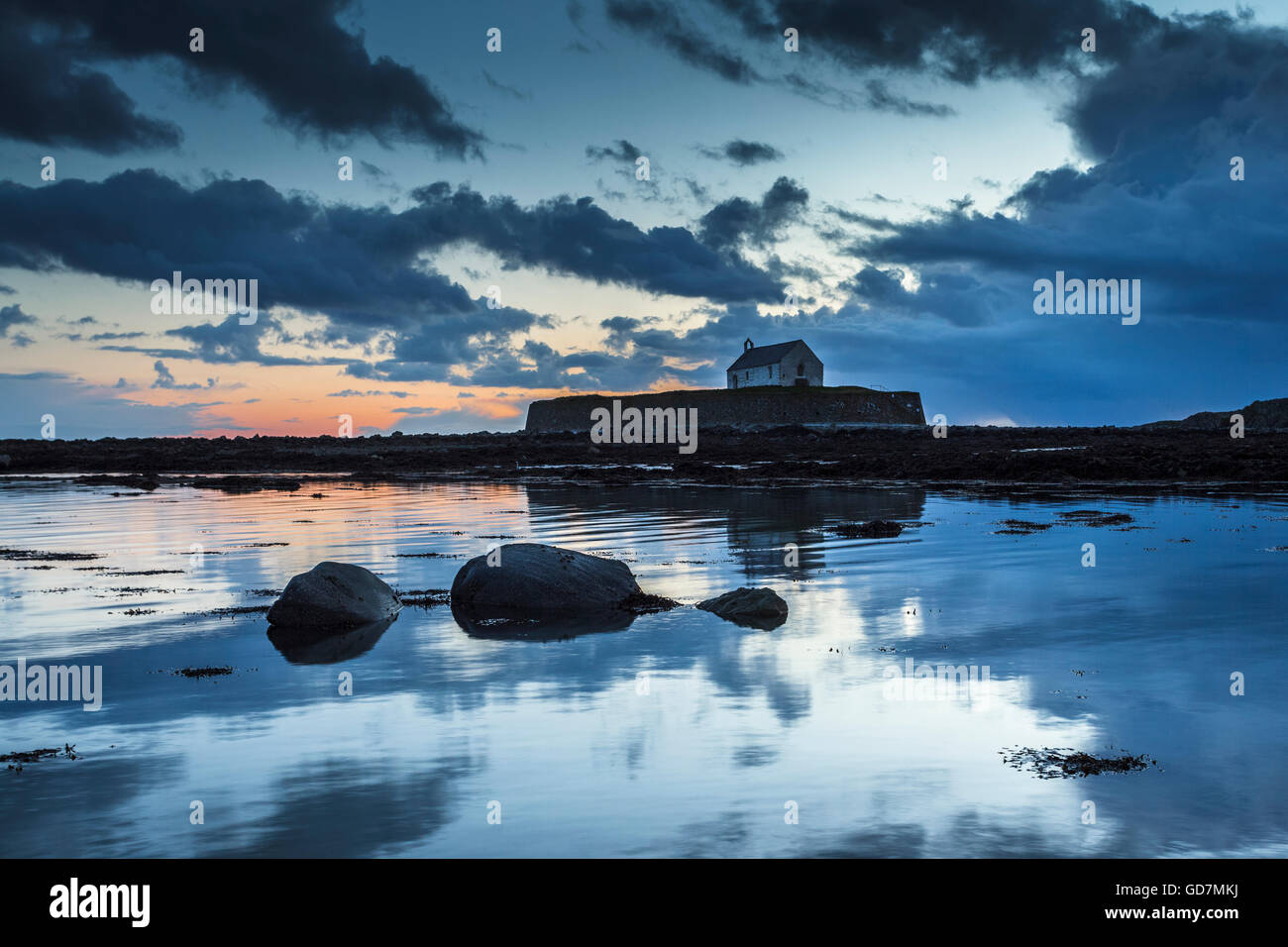 St. Cwyfan's Church at sunset on Anglesey Wales Uk Stock Photo - Alamy