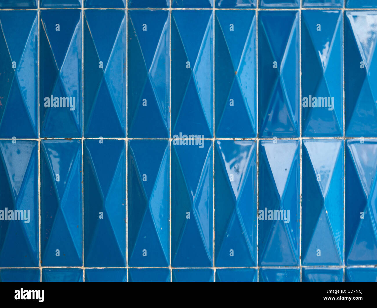 Blue tiles with geometric pattern Stock Photo - Alamy