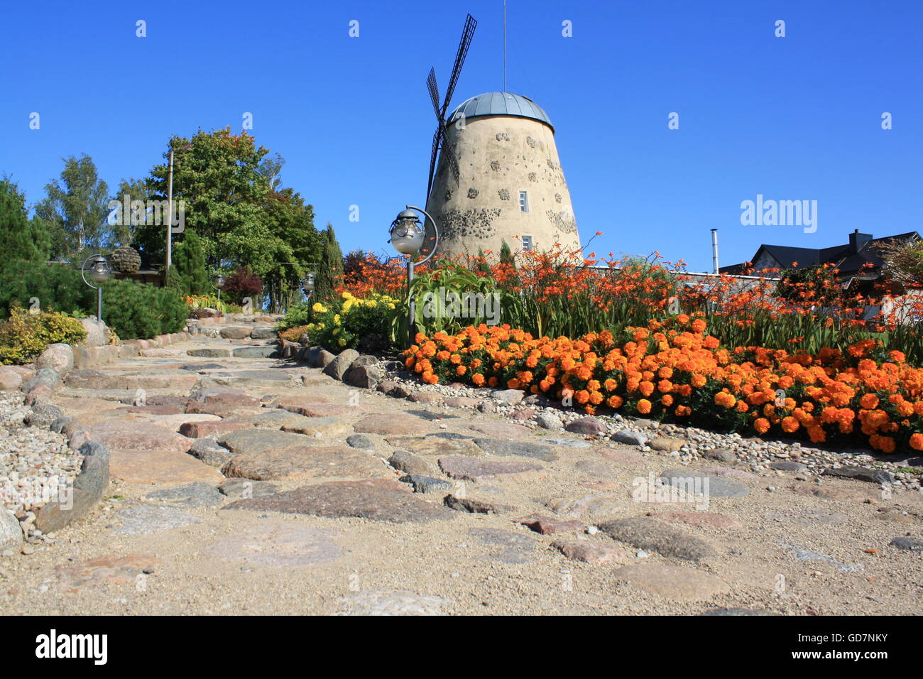 Windmill and flowers hi-res stock photography and images - Alamy