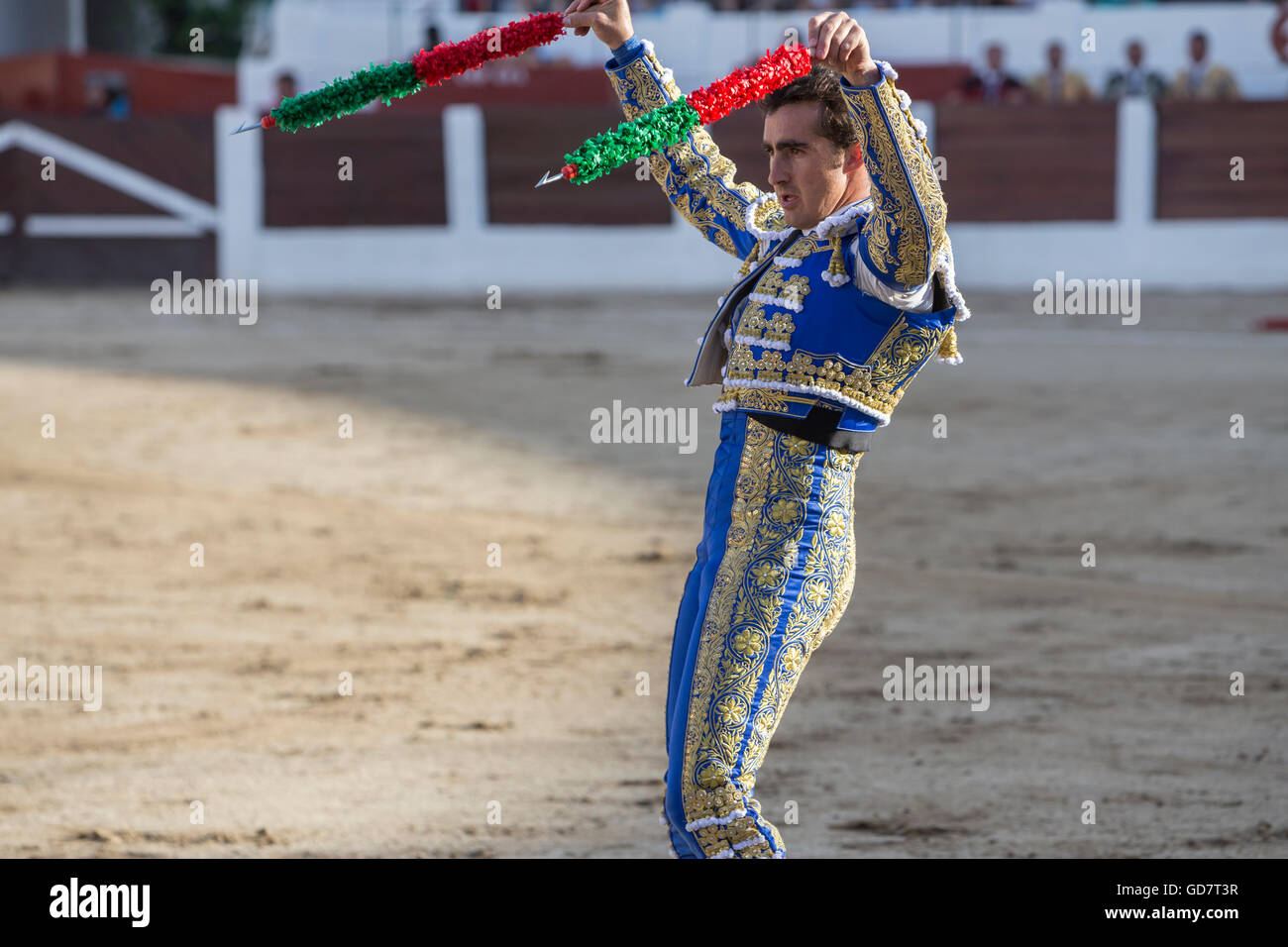 Bullfighter David Fandila El Fandi with flags in each hand, classic of ...