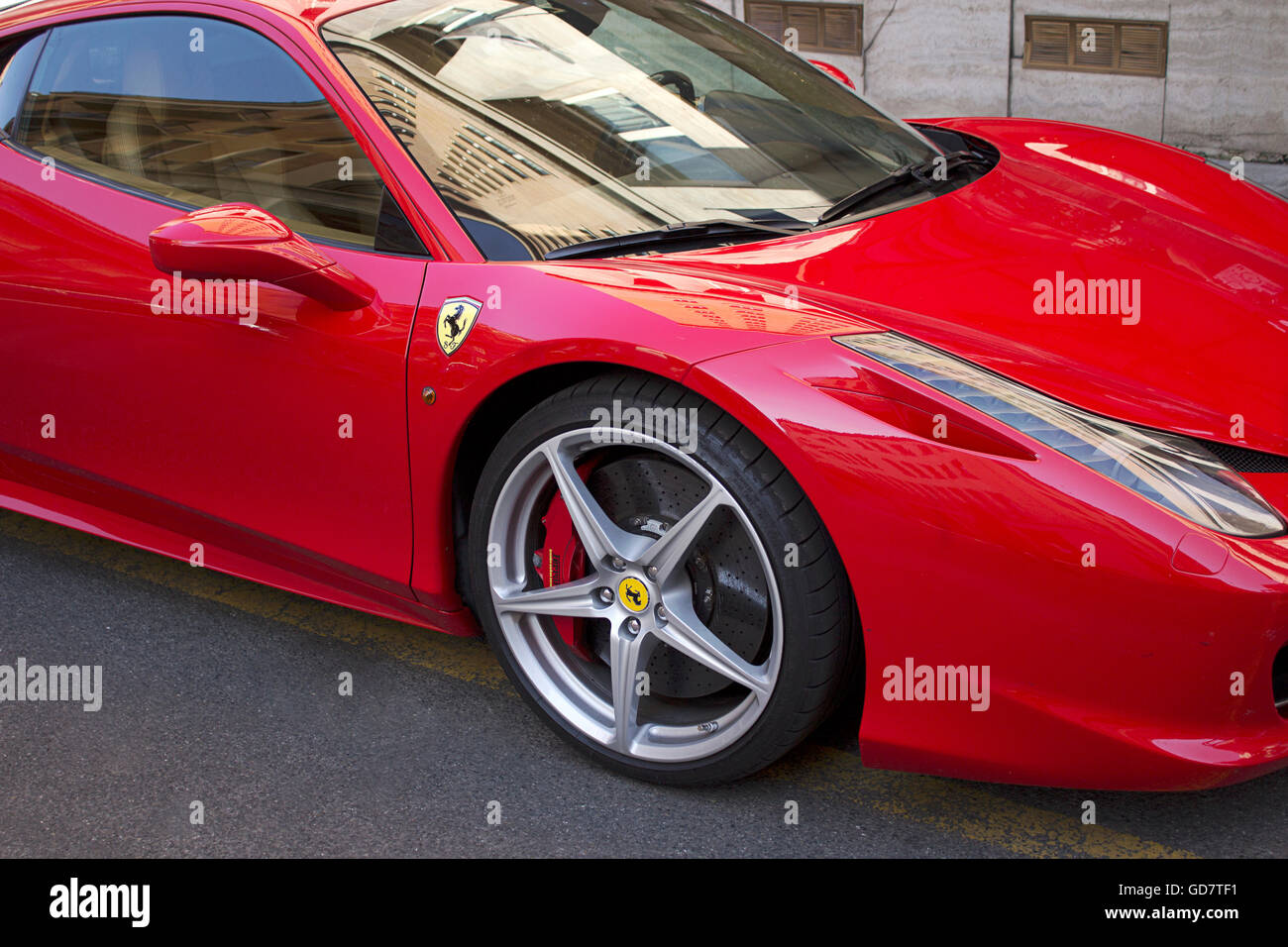 Luxury red Ferrari Italian supercar in front of Principe di Piemonte ...