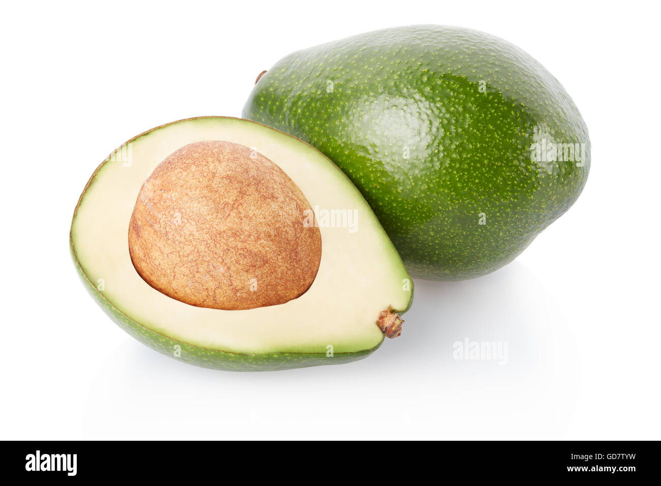 Half avocado on green hi-res stock photography and images - Alamy
