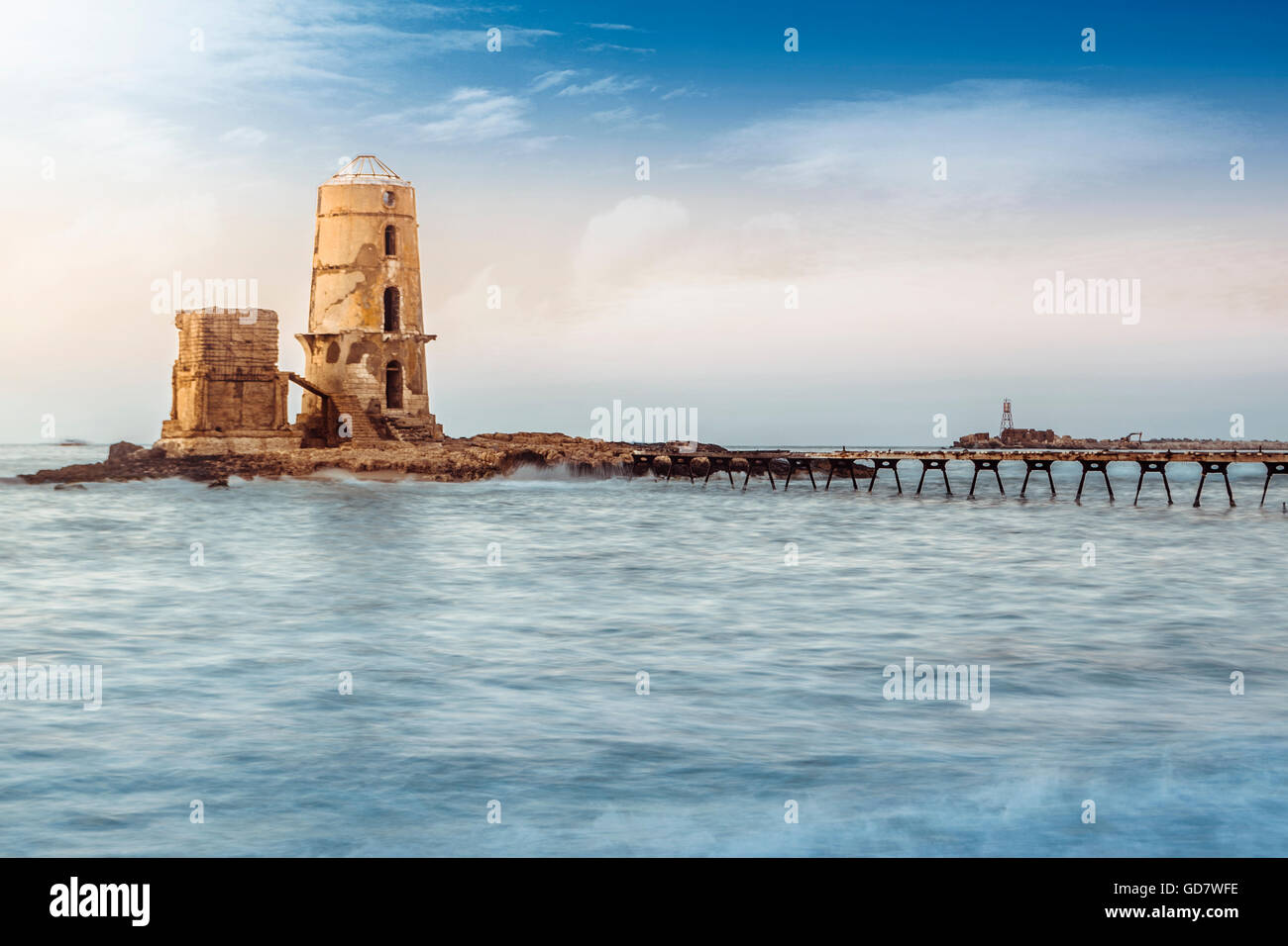 Old Ruined Lighthouse By Seaside at Sunset Stock Photo - Alamy