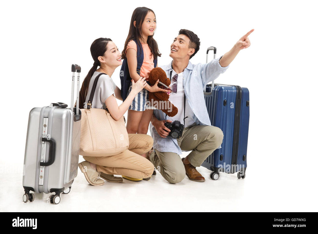 A family of three happy travel Stock Photo - Alamy