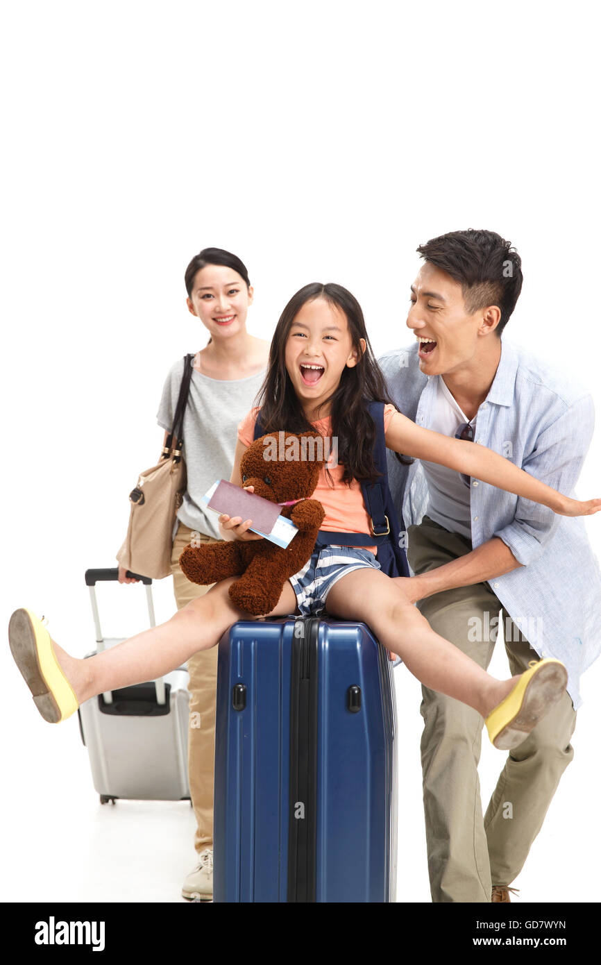 A family of three happy travel Stock Photo - Alamy