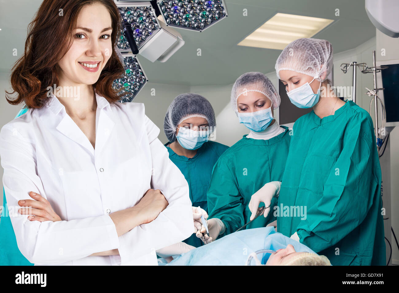 Surgery team in the operating room Stock Photo - Alamy