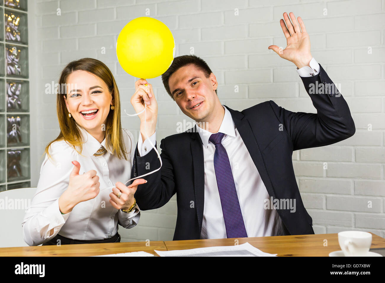 Celebrating success in office Stock Photo - Alamy