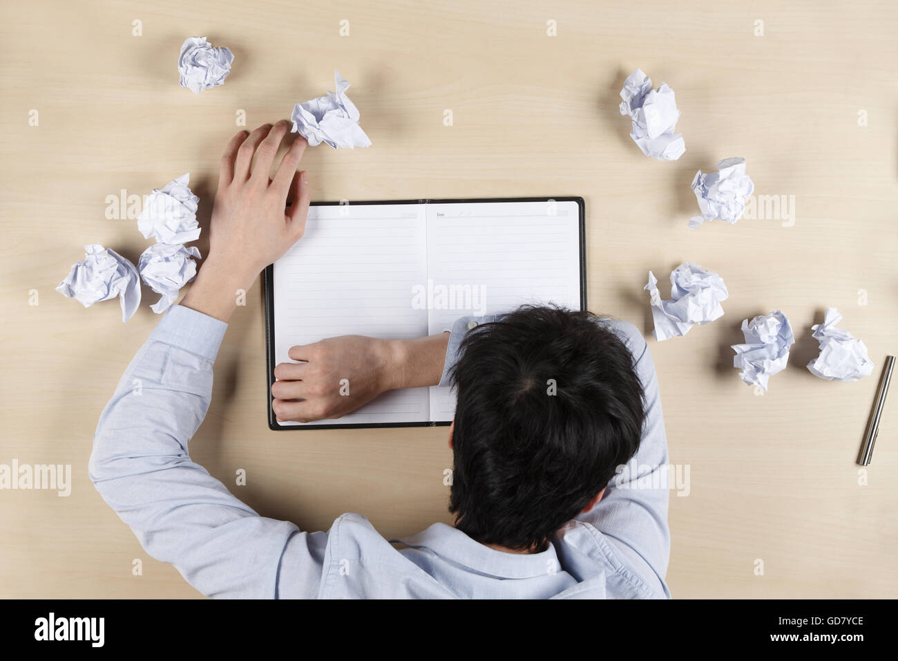 Business people lying on the desk to rest Stock Photo - Alamy