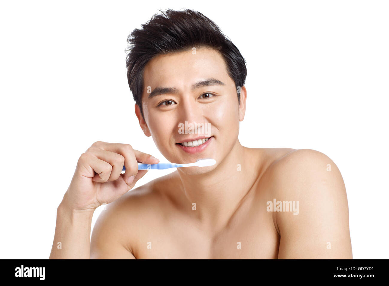 Young men are brushing his teeth Stock Photo - Alamy