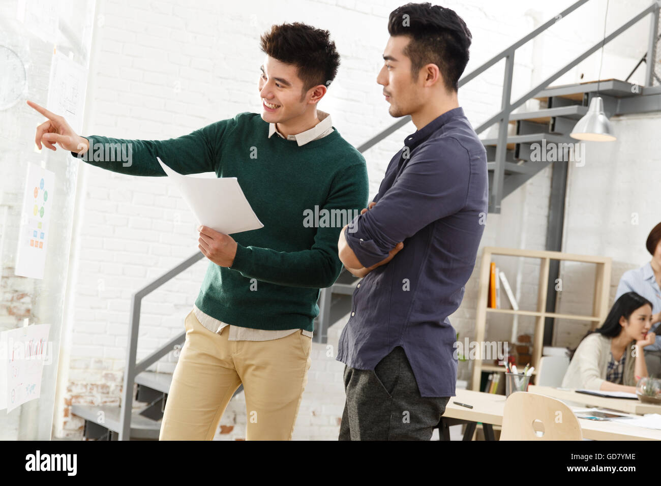 Business people working in the studio Stock Photo - Alamy