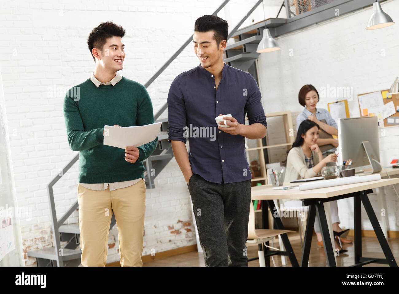 Business people working in the studio Stock Photo - Alamy
