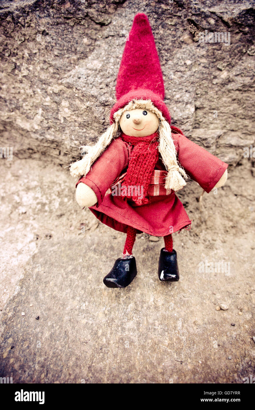 weird doll with red hat Stock Photo - Alamy