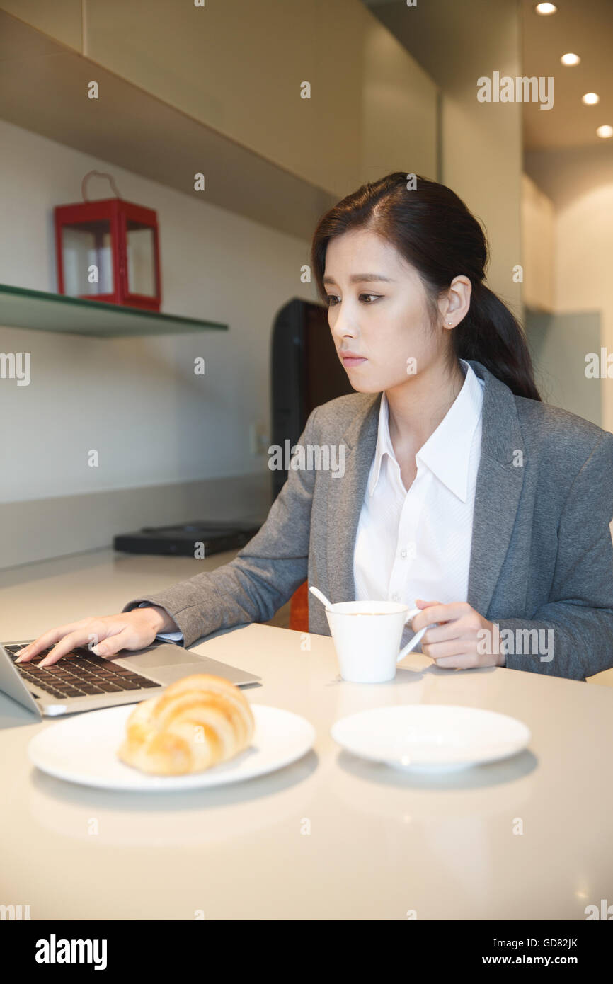 Young women has a breakfast Stock Photo - Alamy