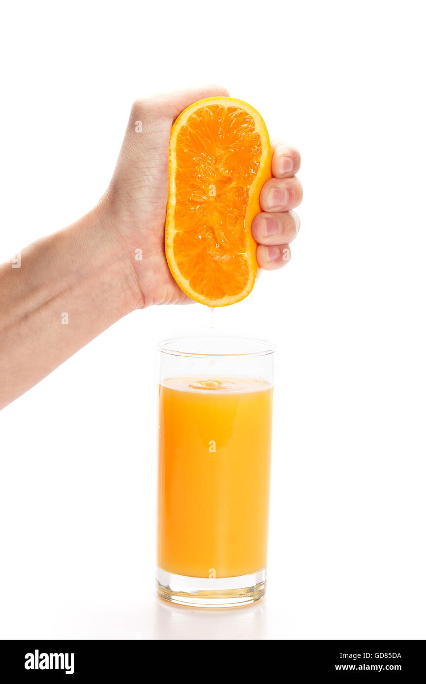 Person squeezing orange juice hi-res stock photography and images - Alamy