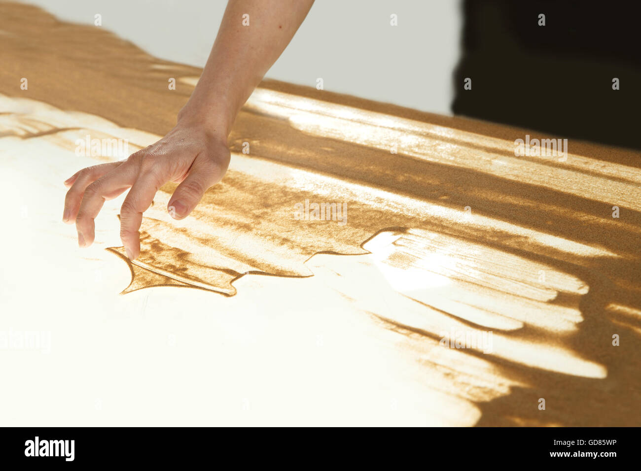 Sand painting creative Stock Photo - Alamy