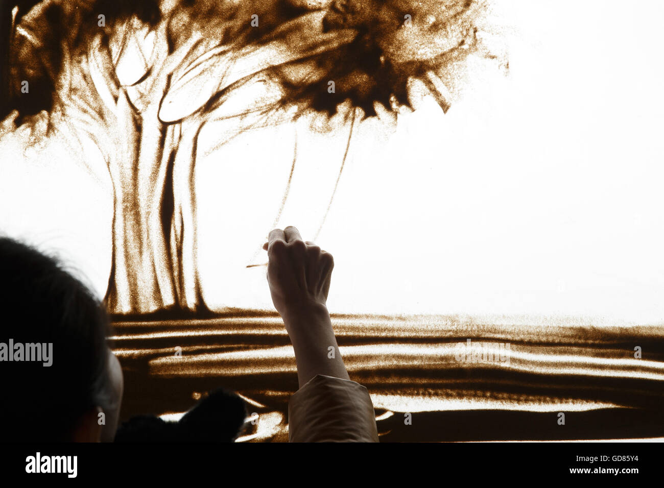 Sand painting creative Stock Photo - Alamy