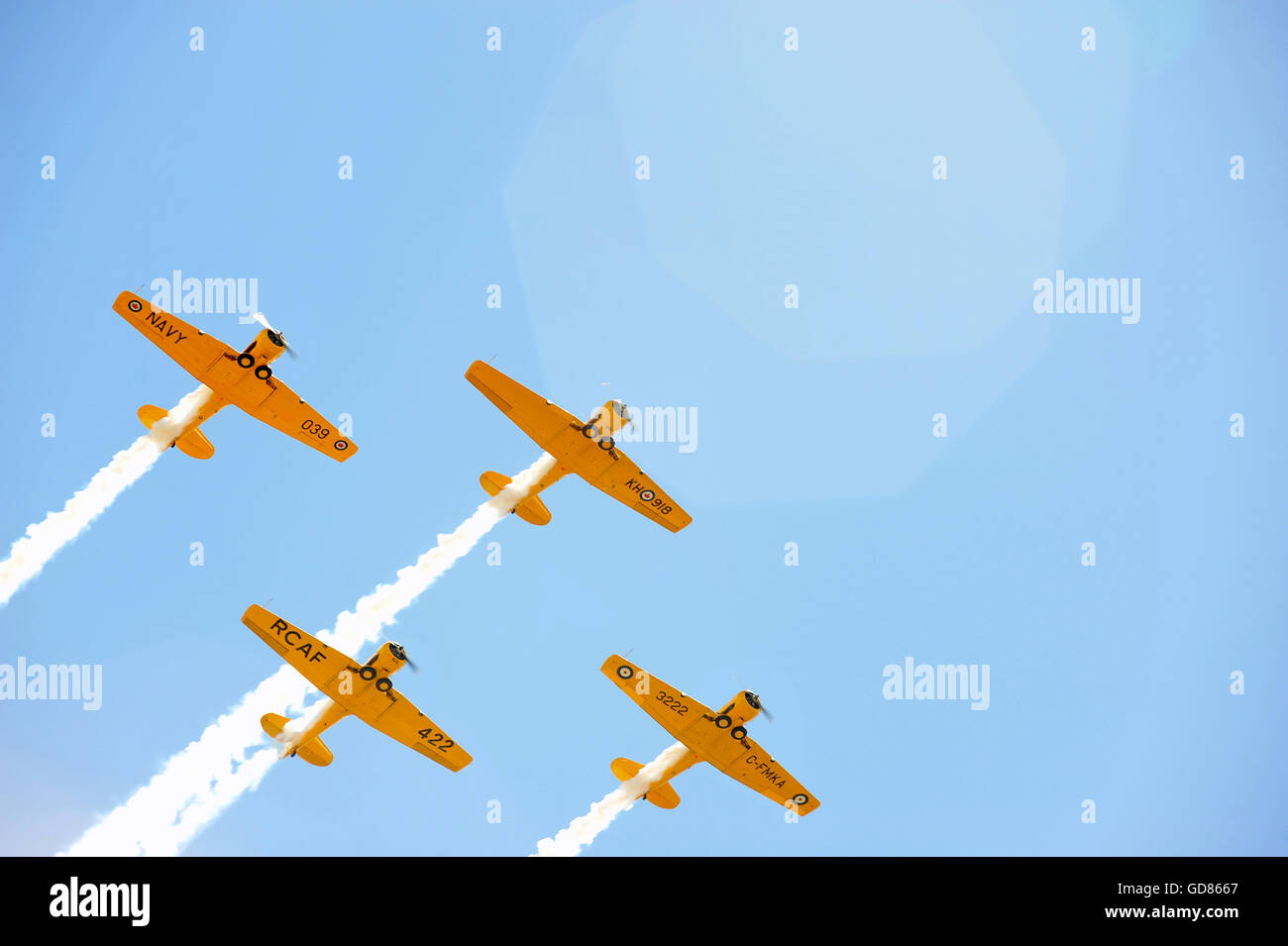 Four planes fly in formation at a Canada Day celebration held in the ...