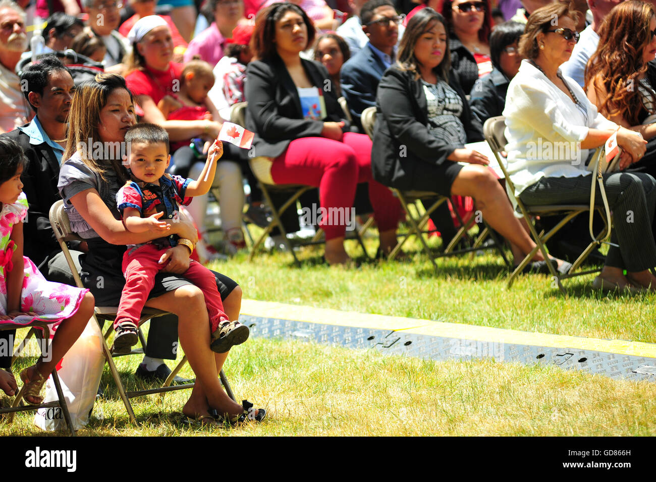 New Canadian citizens take part in a citizenship ceremony at a Canada ...
