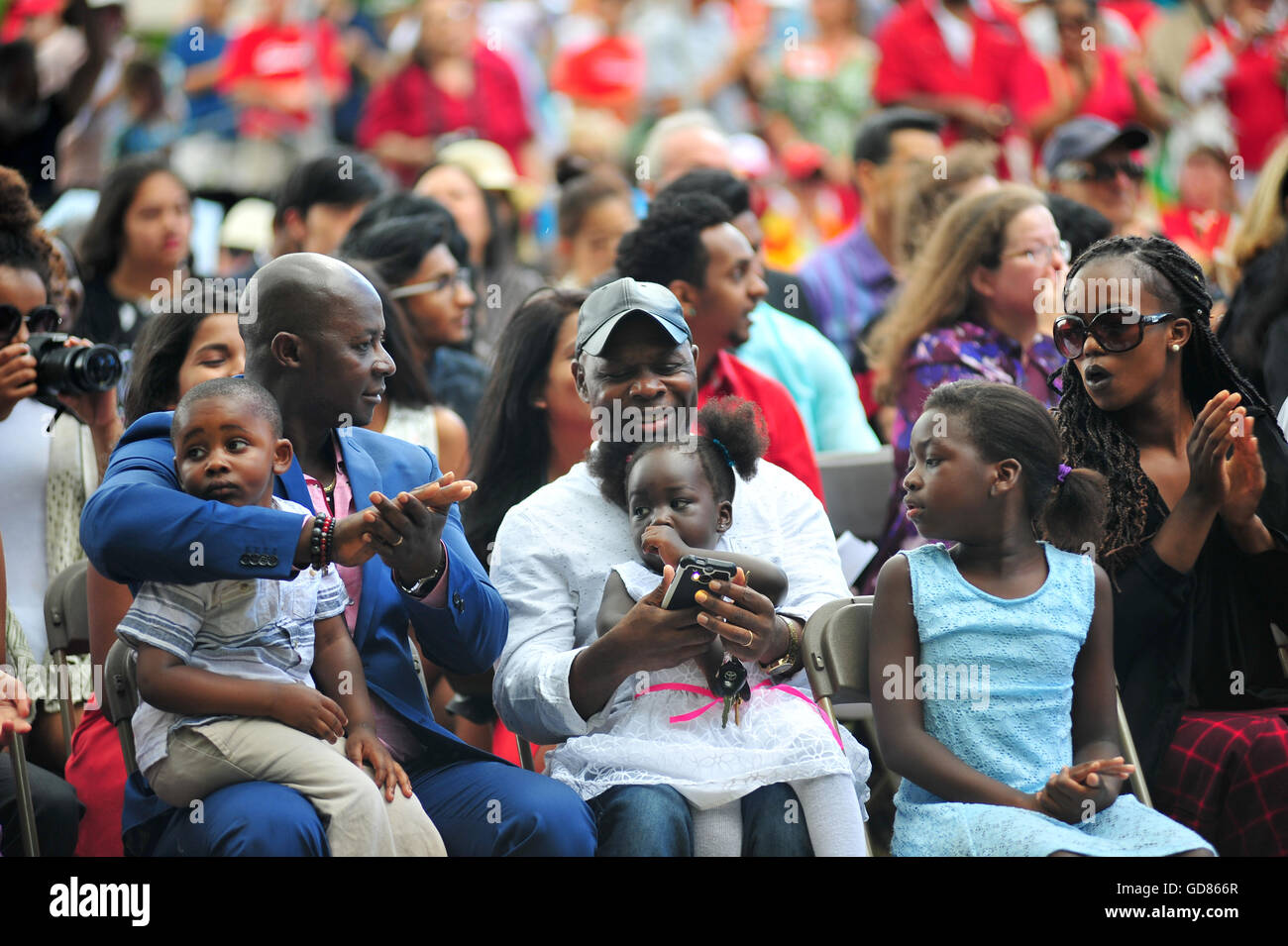 New Canadian citizens take part in a citizenship ceremony at a Canada ...