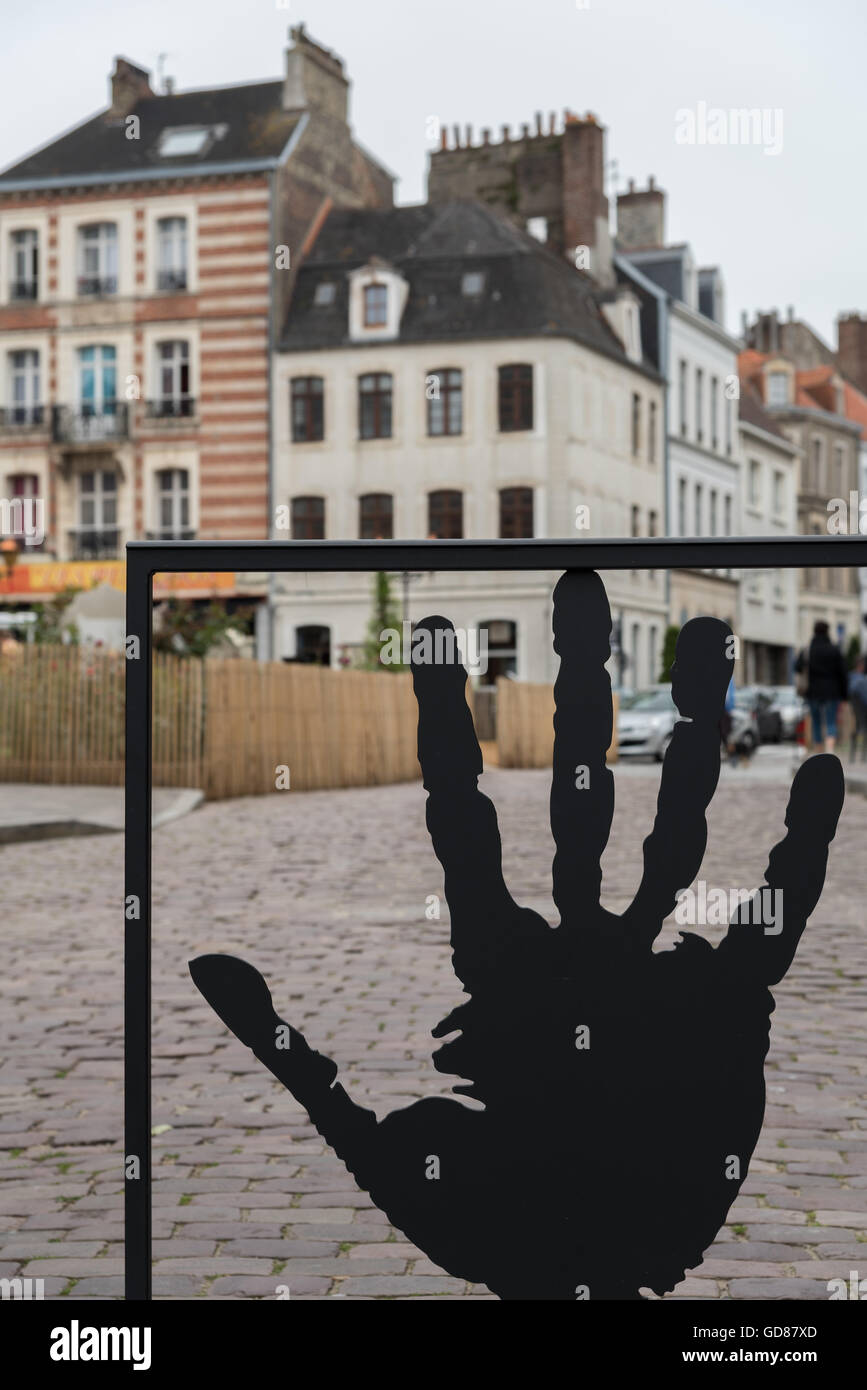 Traditional French buildings viewed through a metalwork hand along Rue ...