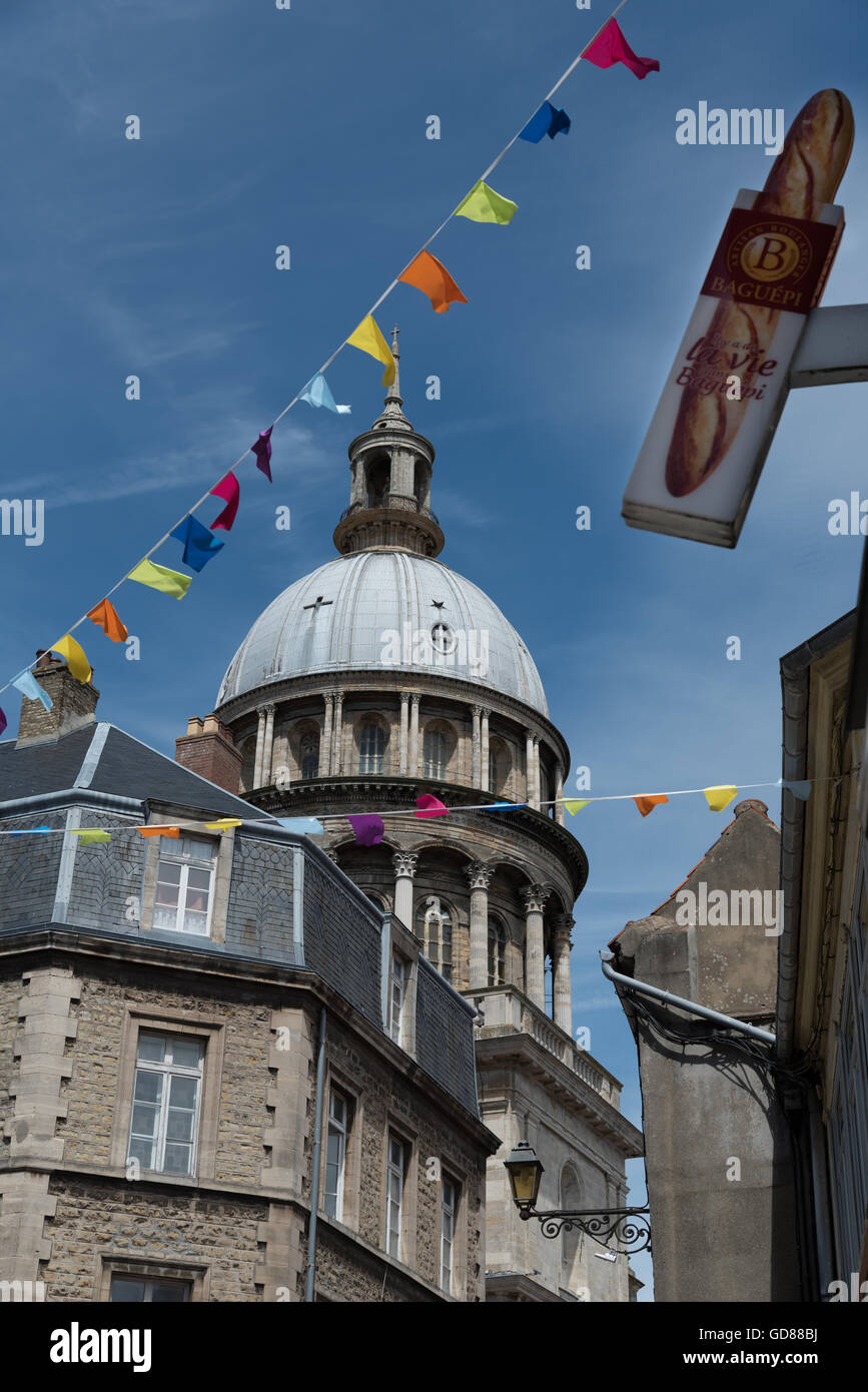 The dome of La Basilique Notre-Dame against a bright blue sky. Boulogne ...