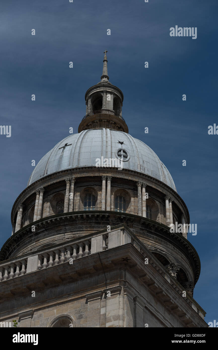 The dome of La Basilique Notre-Dame against a bright blue sky. Boulogne ...