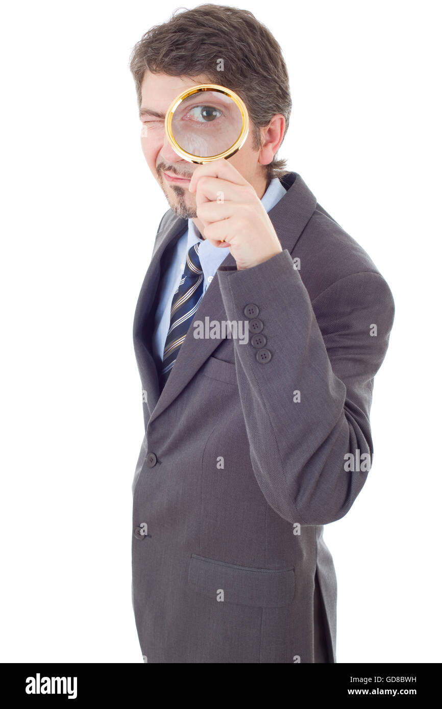 Isolated young business man with magnifying glass Stock Photo - Alamy