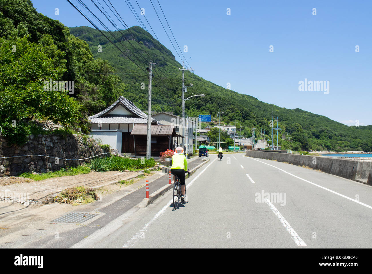 Japanese woman riding bicycle hi-res stock photography and images - Alamy