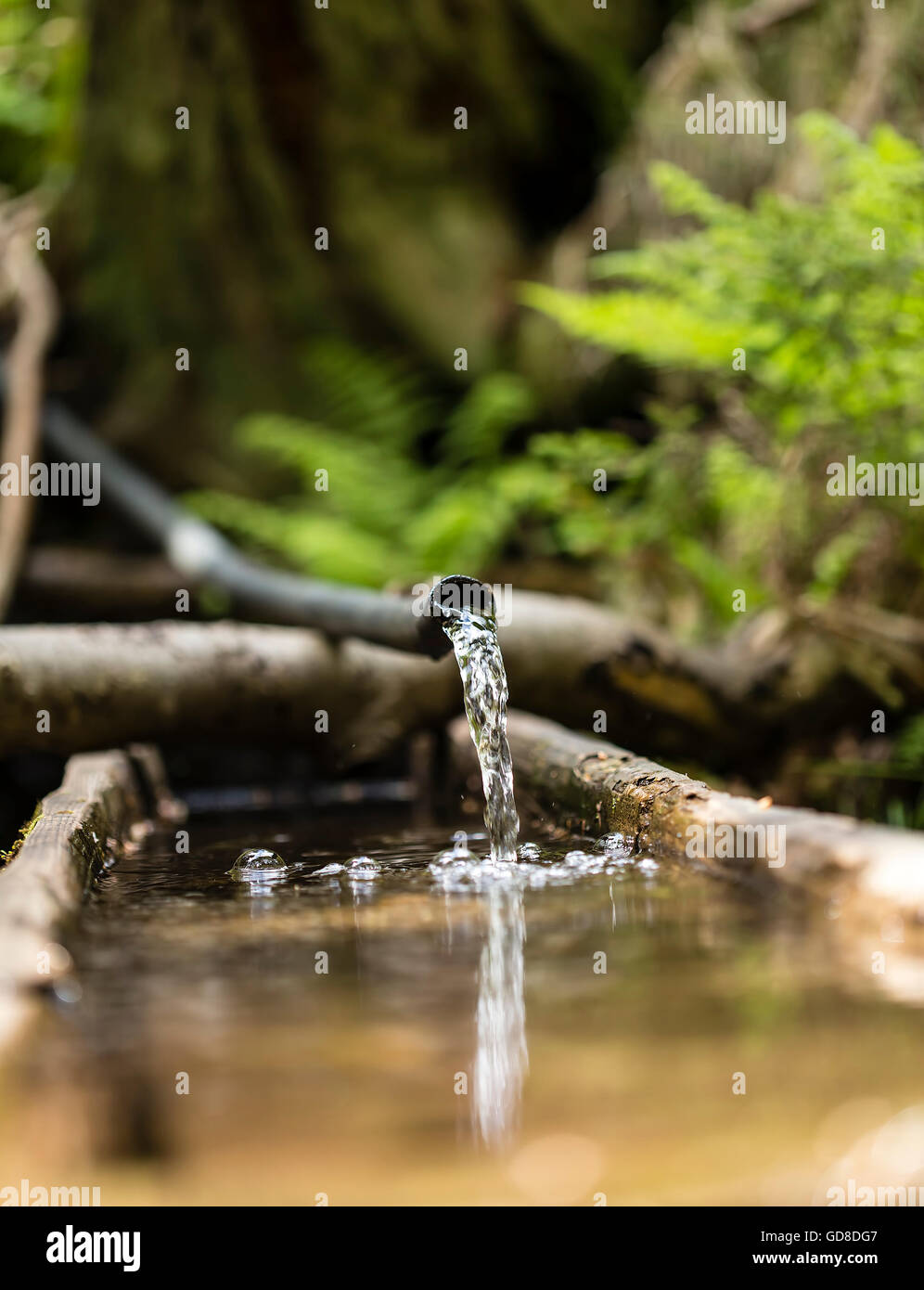 Water pouring from pipe hi-res stock photography and images - Alamy