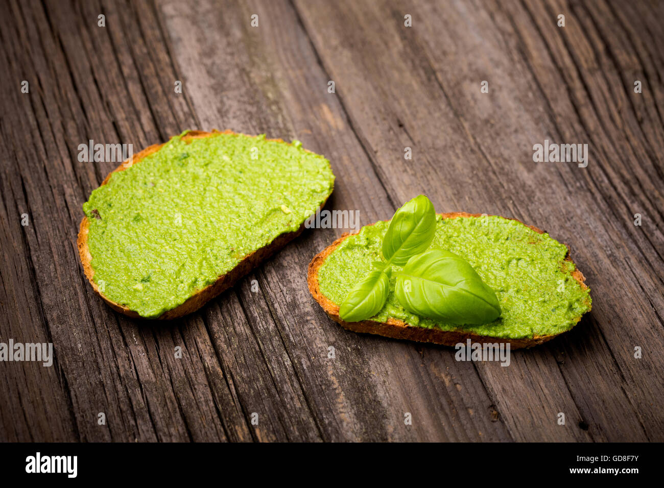 Natural homemade DIY vegan very healthy green pesto made of rocket ...