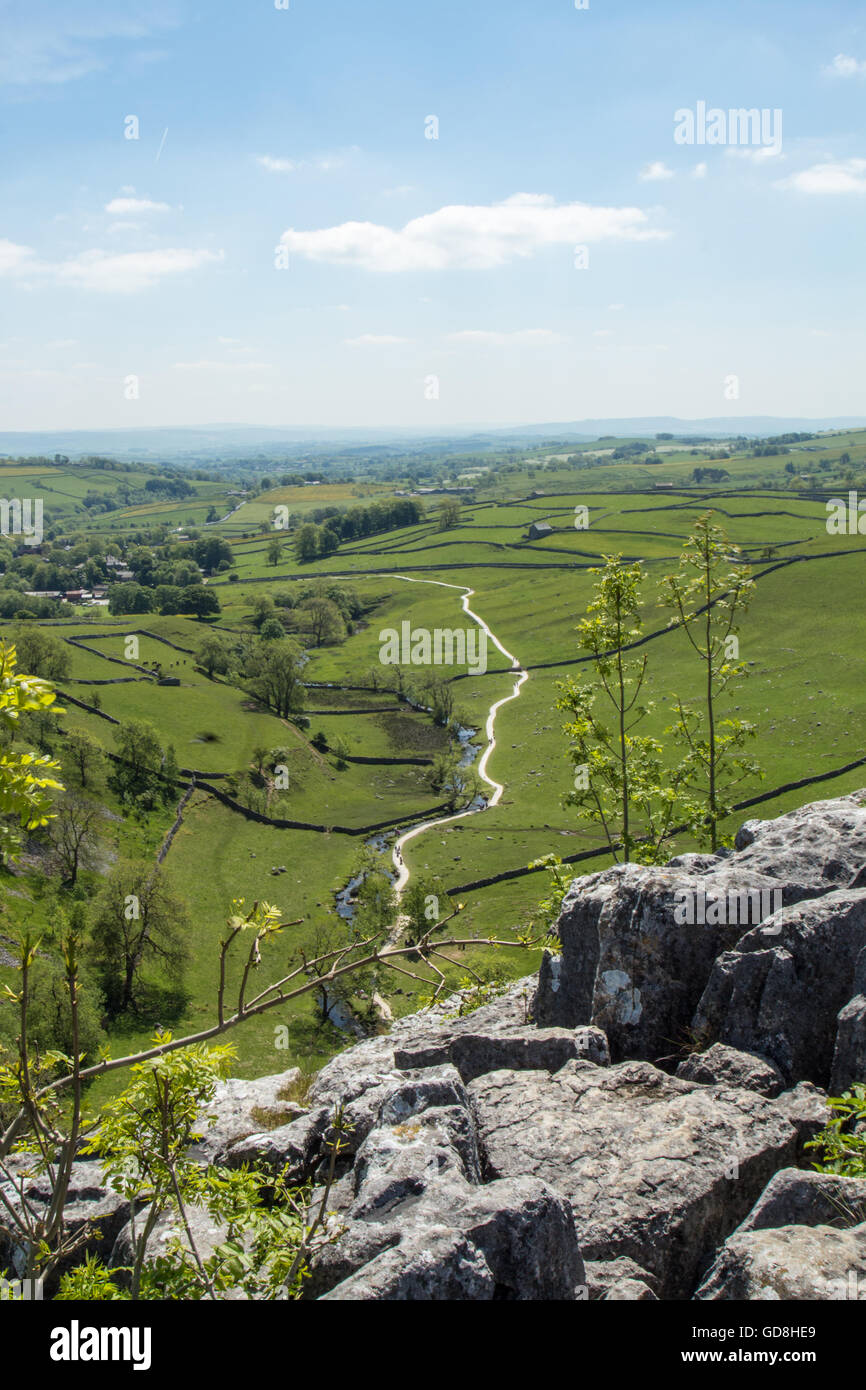 Malham cove is a limestone formation malham hi-res stock photography ...