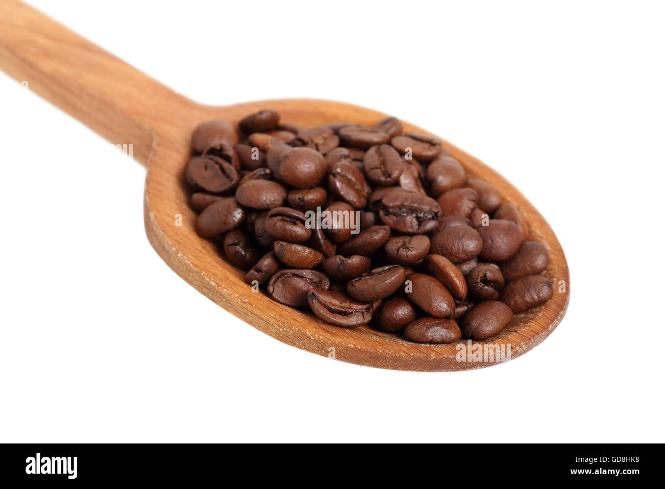 Coffee beans on wooden spoon. Isolated with clipping path Stock Photo ...